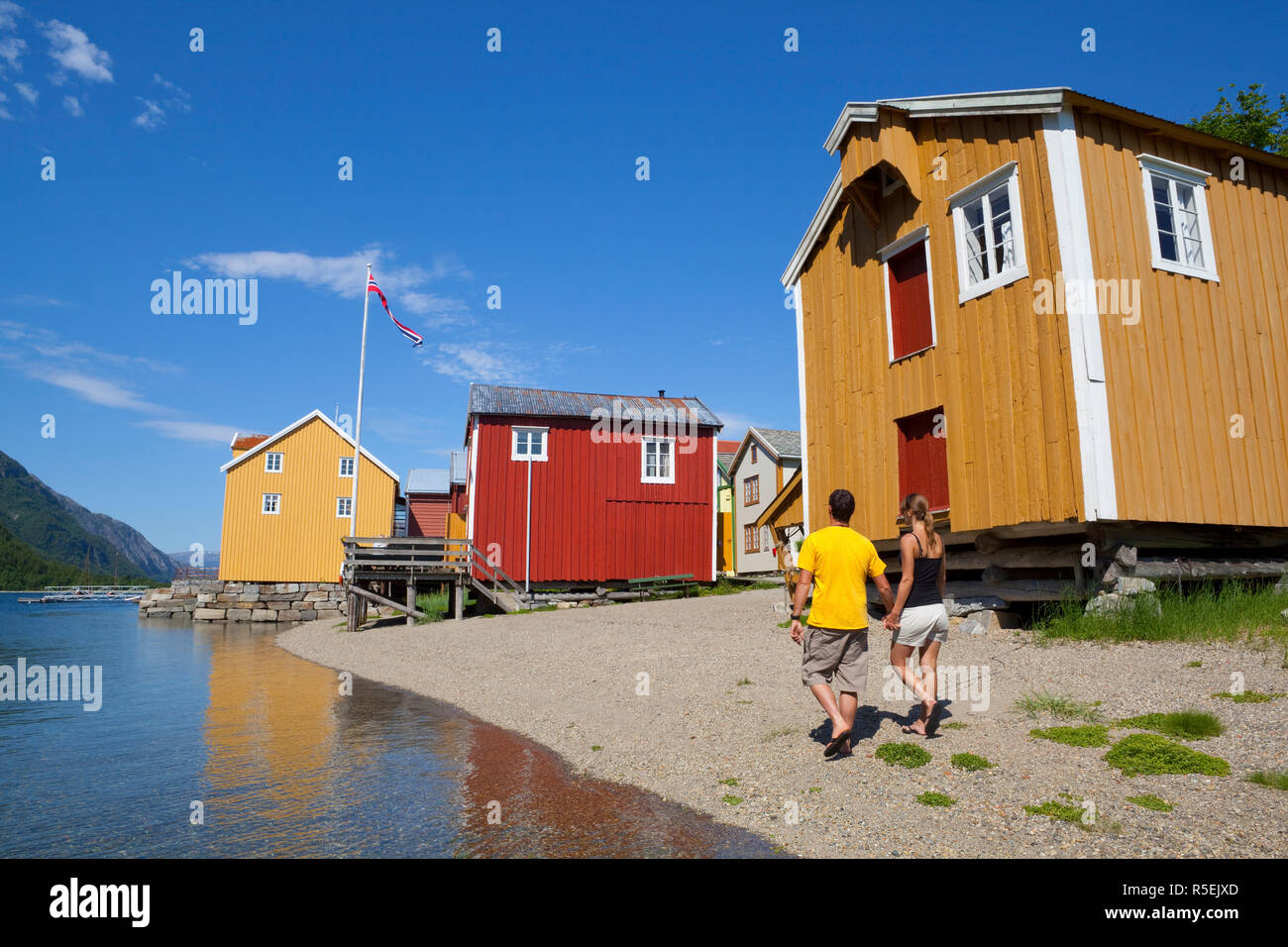 Toursits explore Mosjoen's colorful Fishing Warehouses, Mosjoen ...