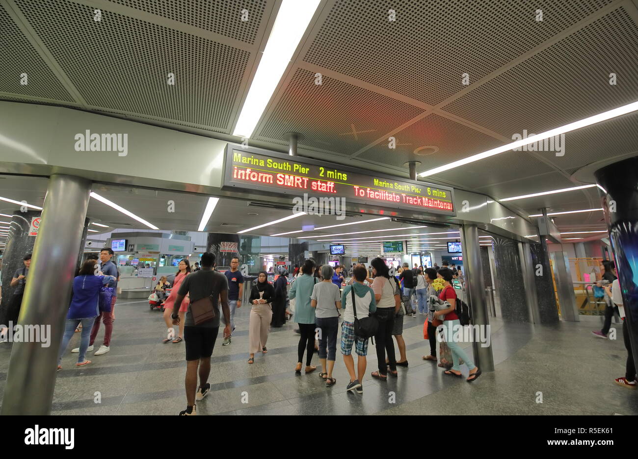 People travel by MRT subway at Orchard road station Singapore Stock ...