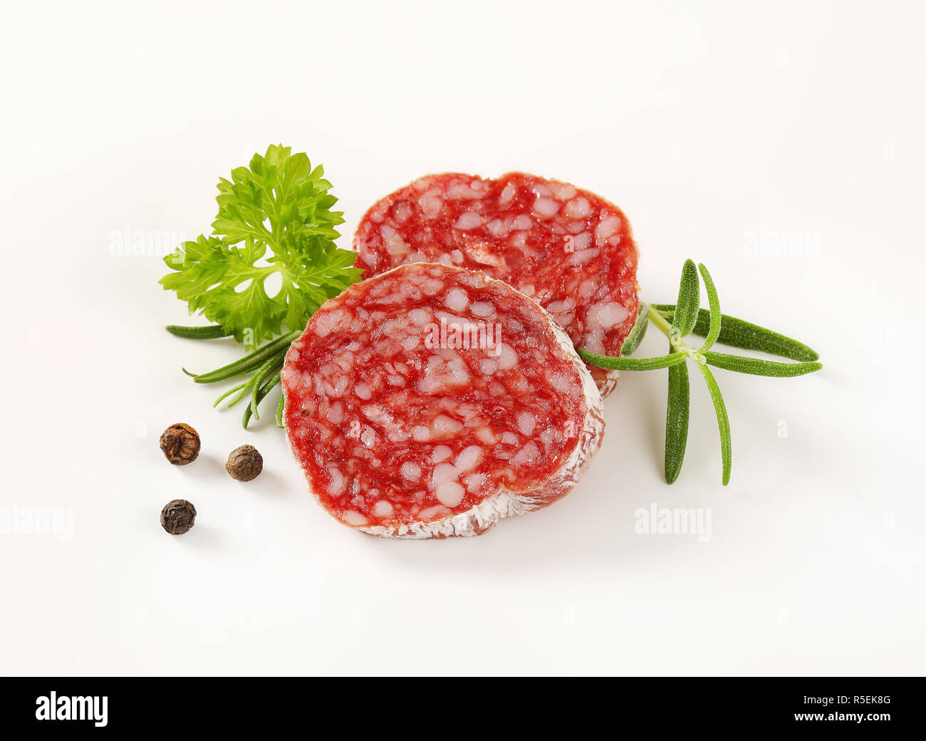 Dry cured sausage slices Stock Photo - Alamy