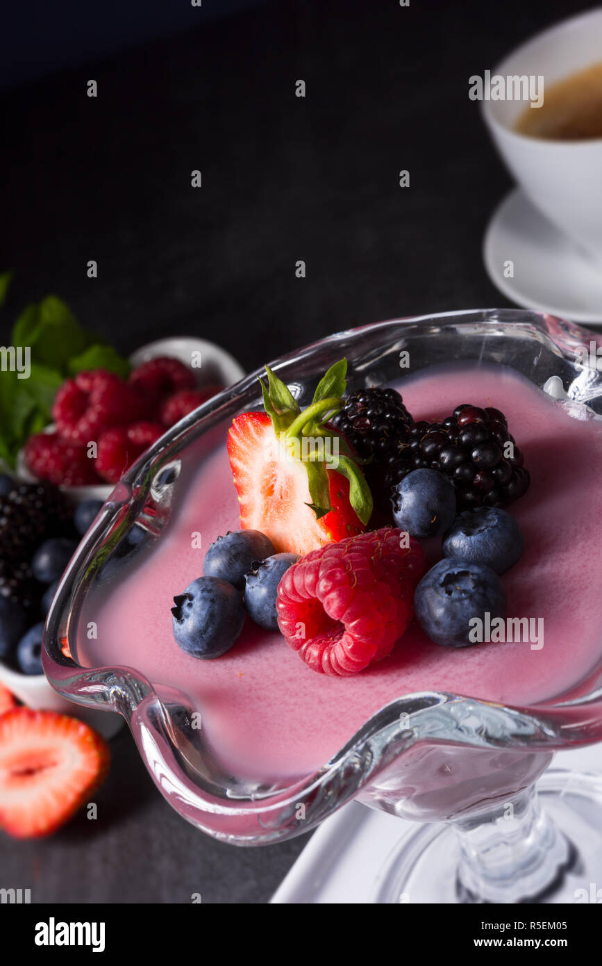 delicious pudding with wild berry Stock Photo - Alamy