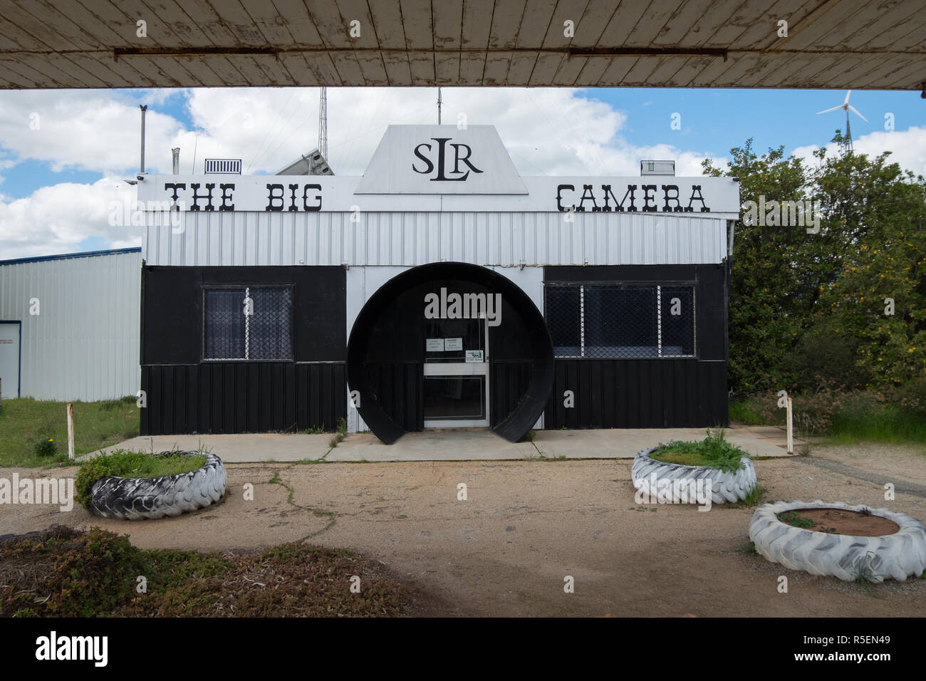 A funky camera museum in a building that looks like a camera. In ...
