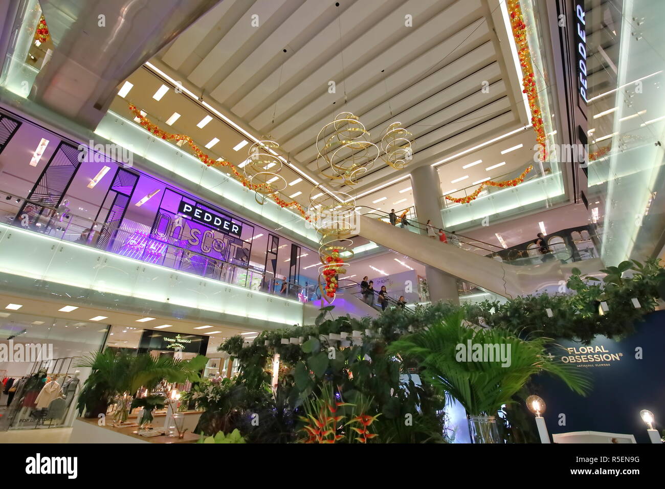 People visit Scotts Square shopping mall in Orchard road Singapore ...