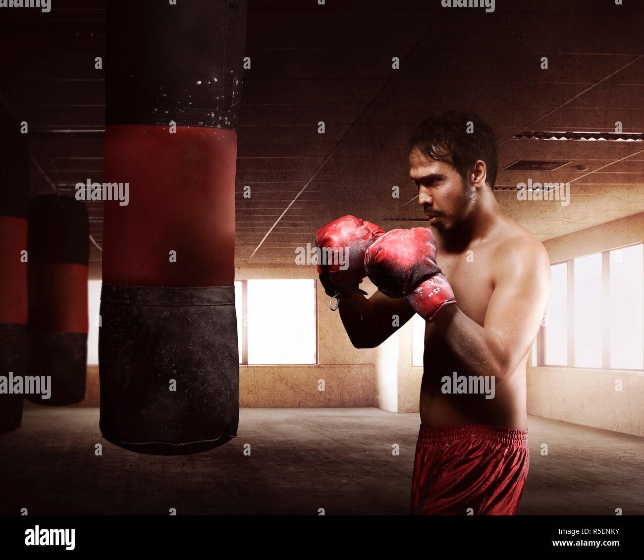 Muscular asian man boxer training hi-res stock photography and images ...