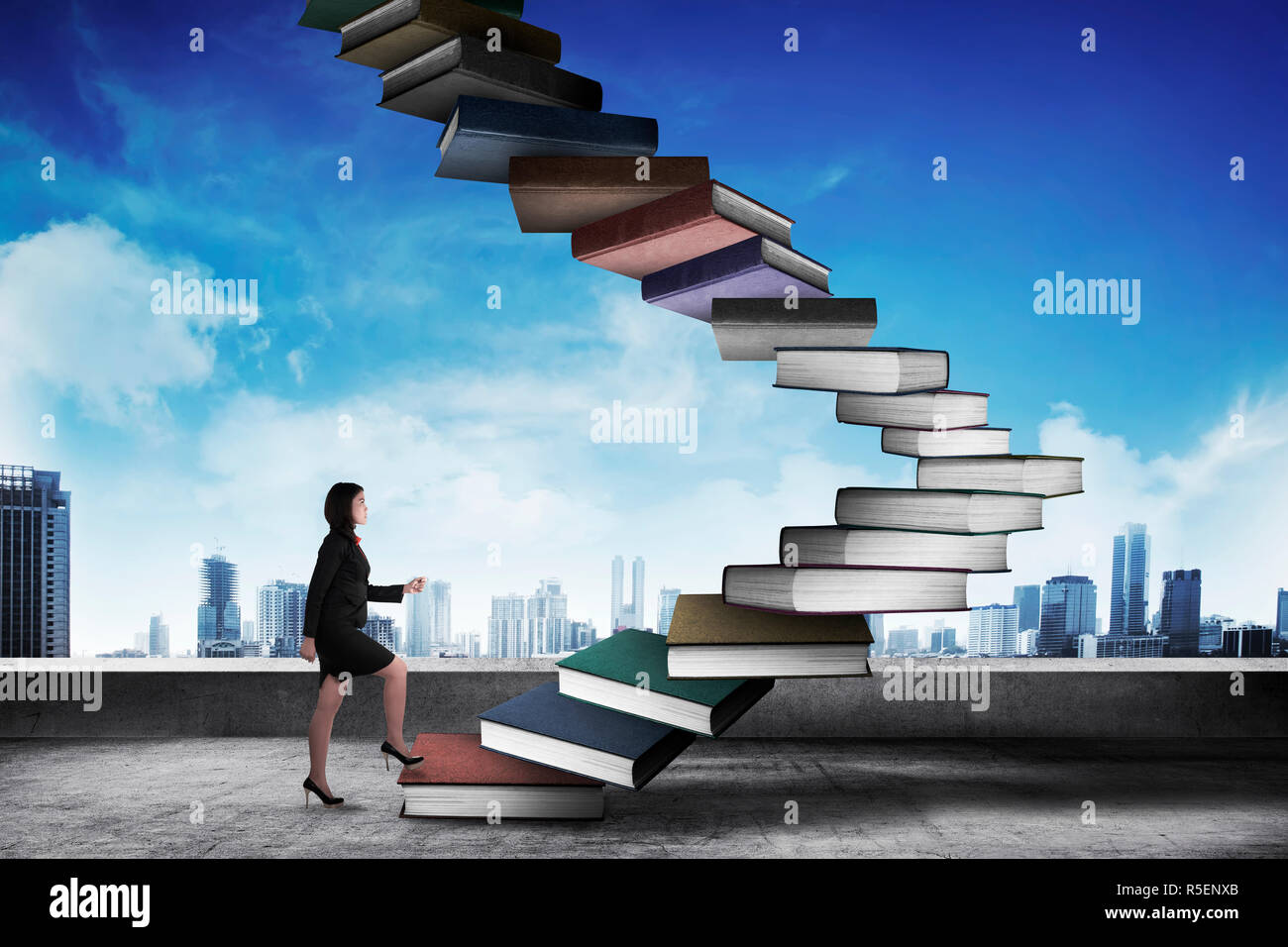 Business person step up flying book that look like stair Stock Photo ...