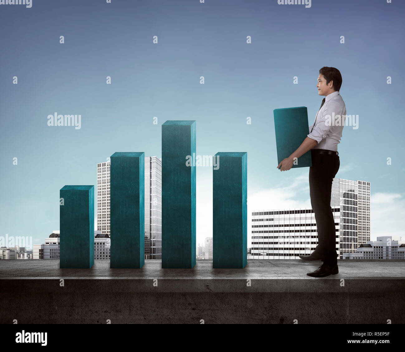 Asian business man carry heavy chart bar Stock Photo - Alamy