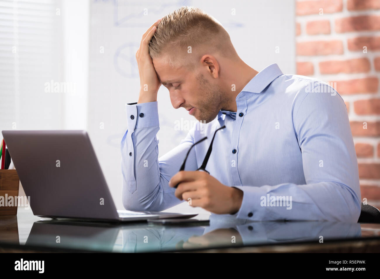 Worried businessman desk stressful hi-res stock photography and images ...