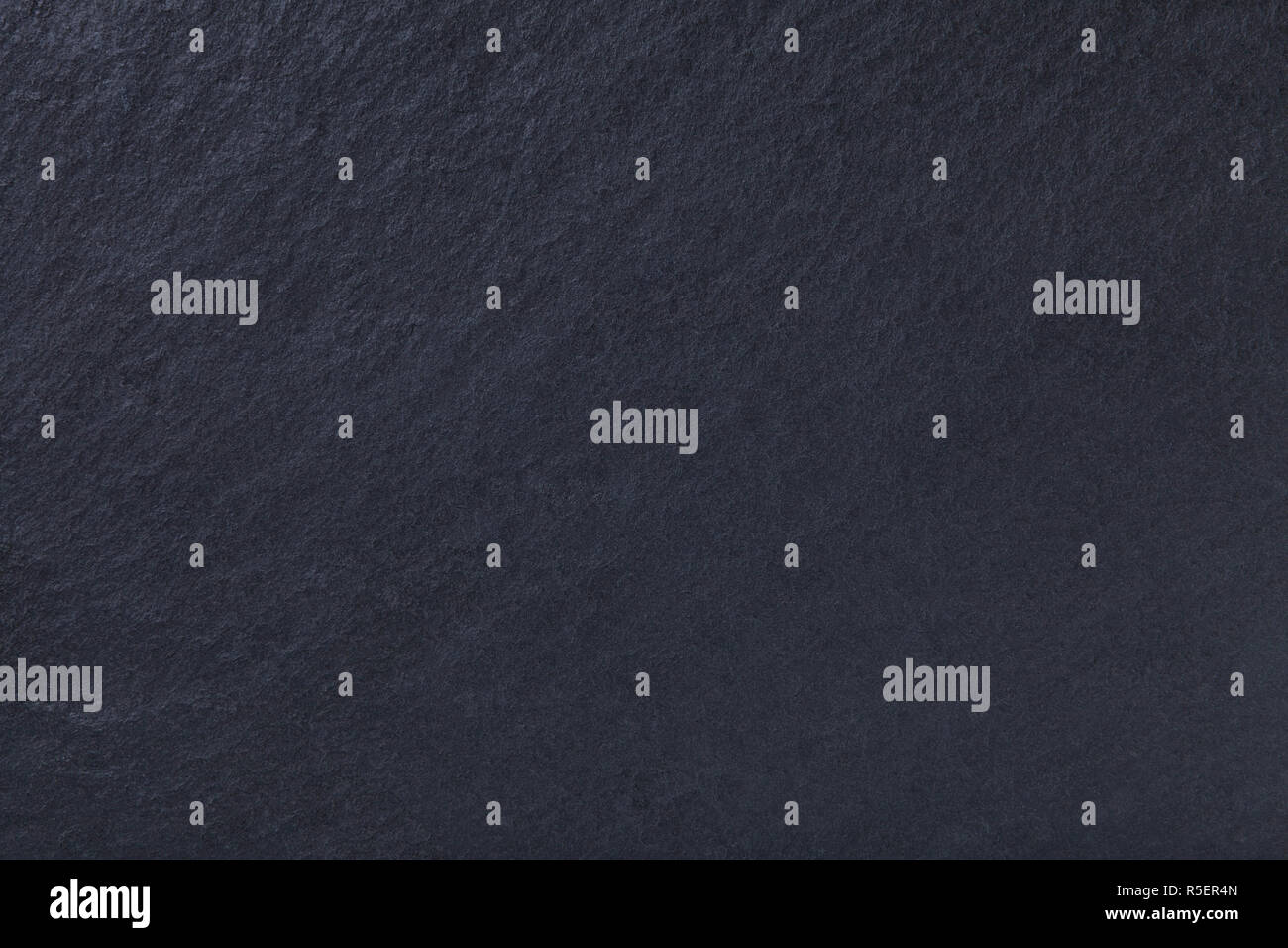 Dark gray background of natural slate. Texture black stone close up ...