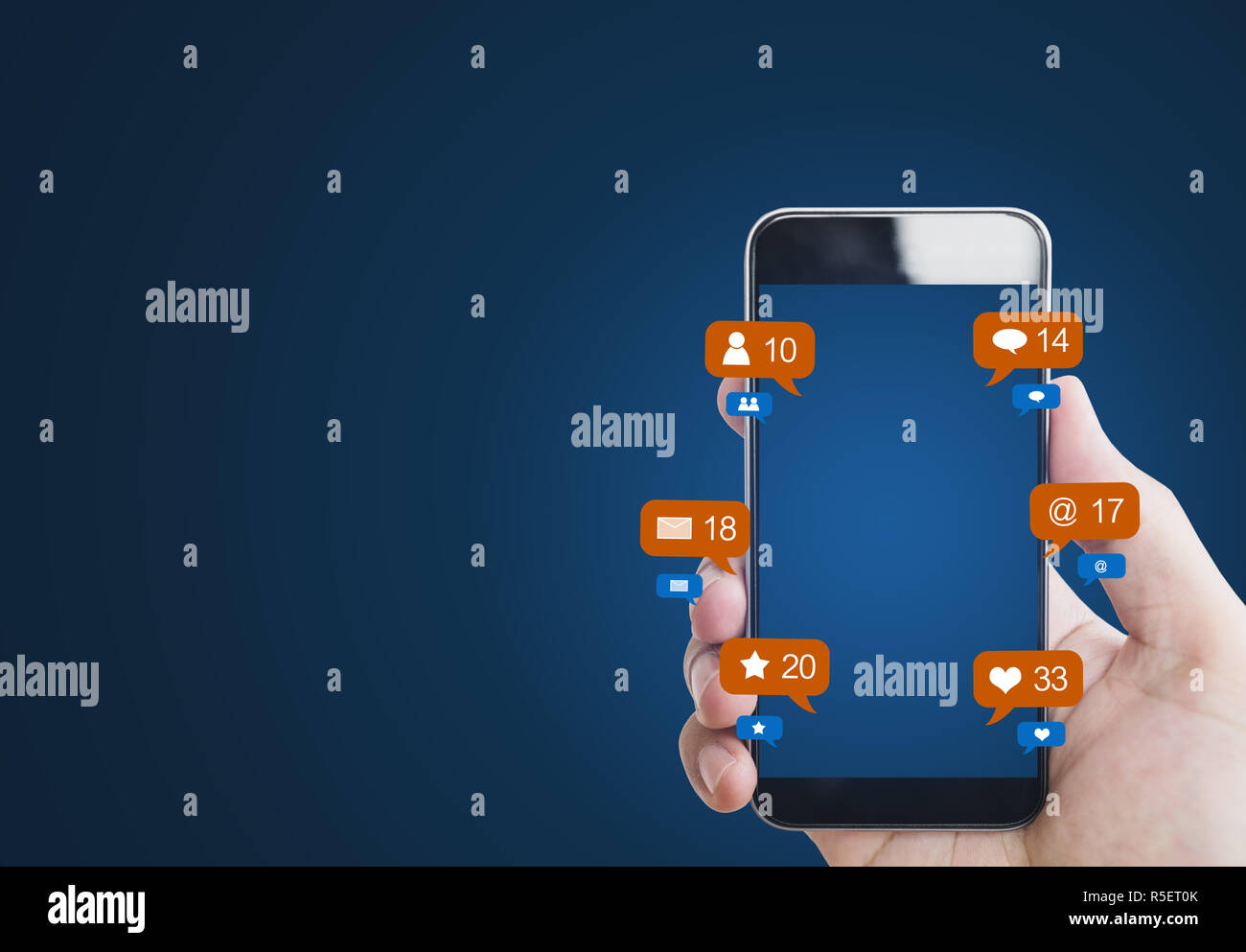 Hand holding mobile smart phone, with notification icons and blank ...