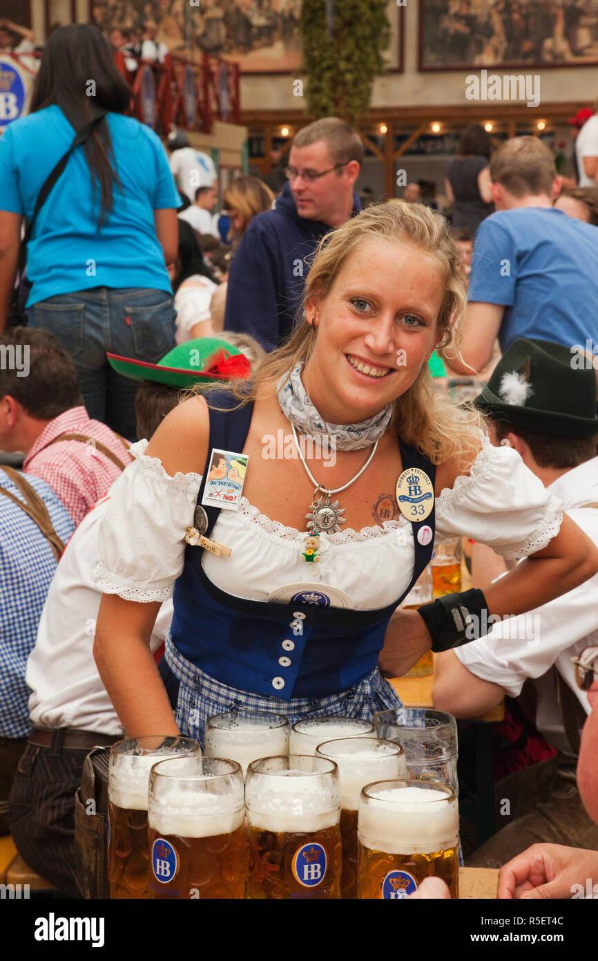 Germany Bavaria Munich Oktoberfest Waitress With Beer Steins Stock