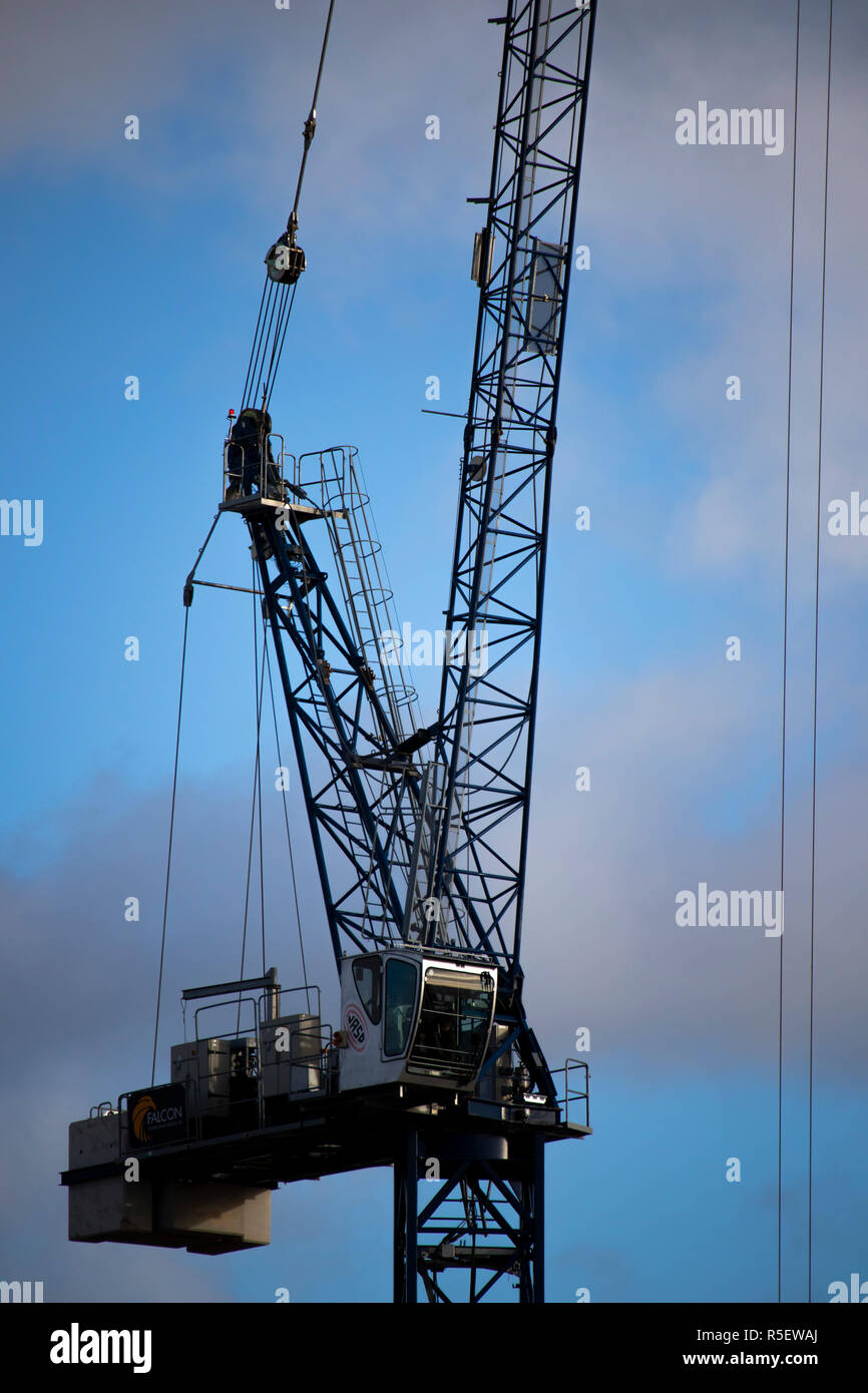 Construction site tower crane over building development Stock Photo - Alamy