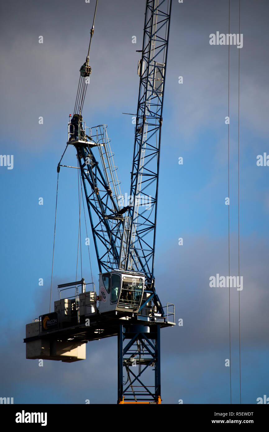 Construction site tower crane over building development Stock Photo - Alamy
