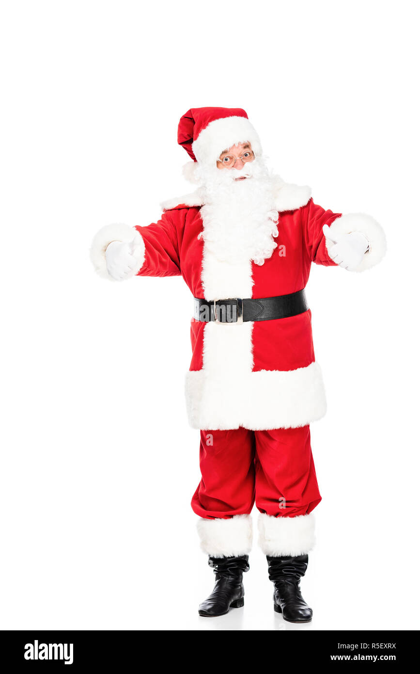 santa claus looking at camera and showing thumbs up isolated on white ...
