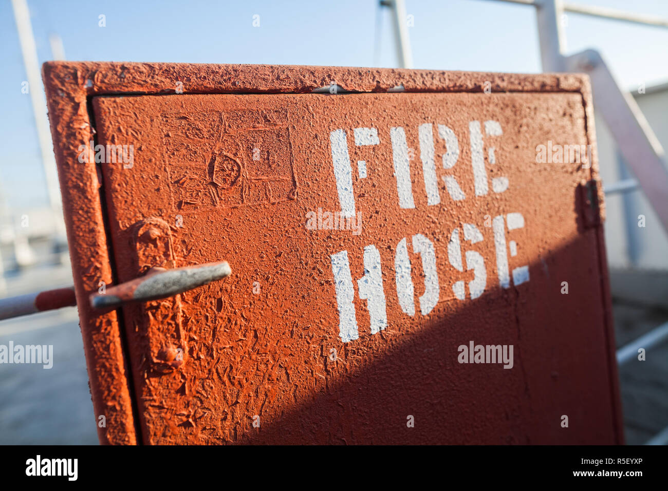 Fire hose reel on wall hi-res stock photography and images - Alamy