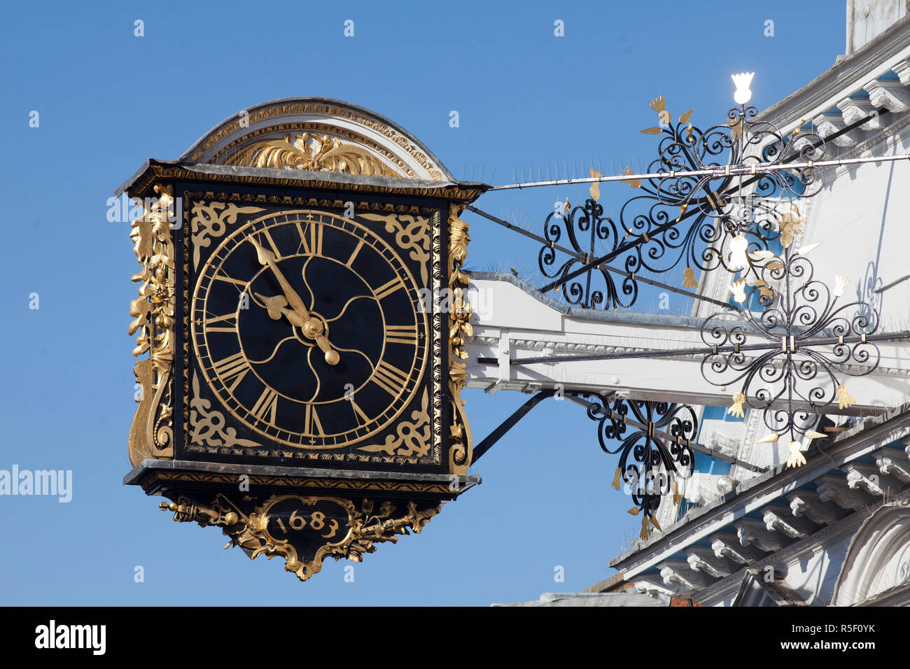 Old clock on the Guildhall, High Street, Guildford, Surrey, England, UK ...