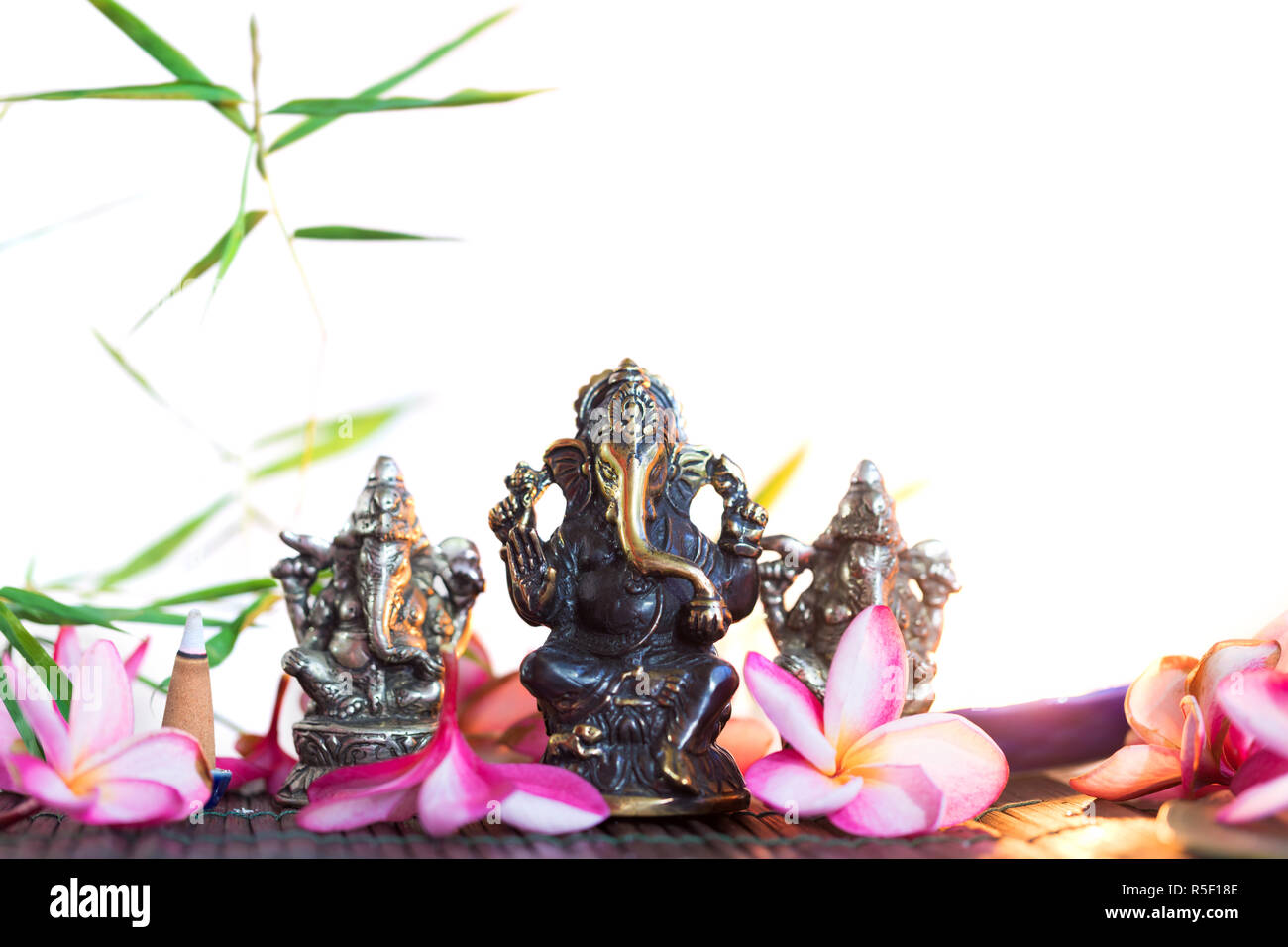 Statue of Ganesha Indian Hinduism God of wisdom and prosperity and heap ...