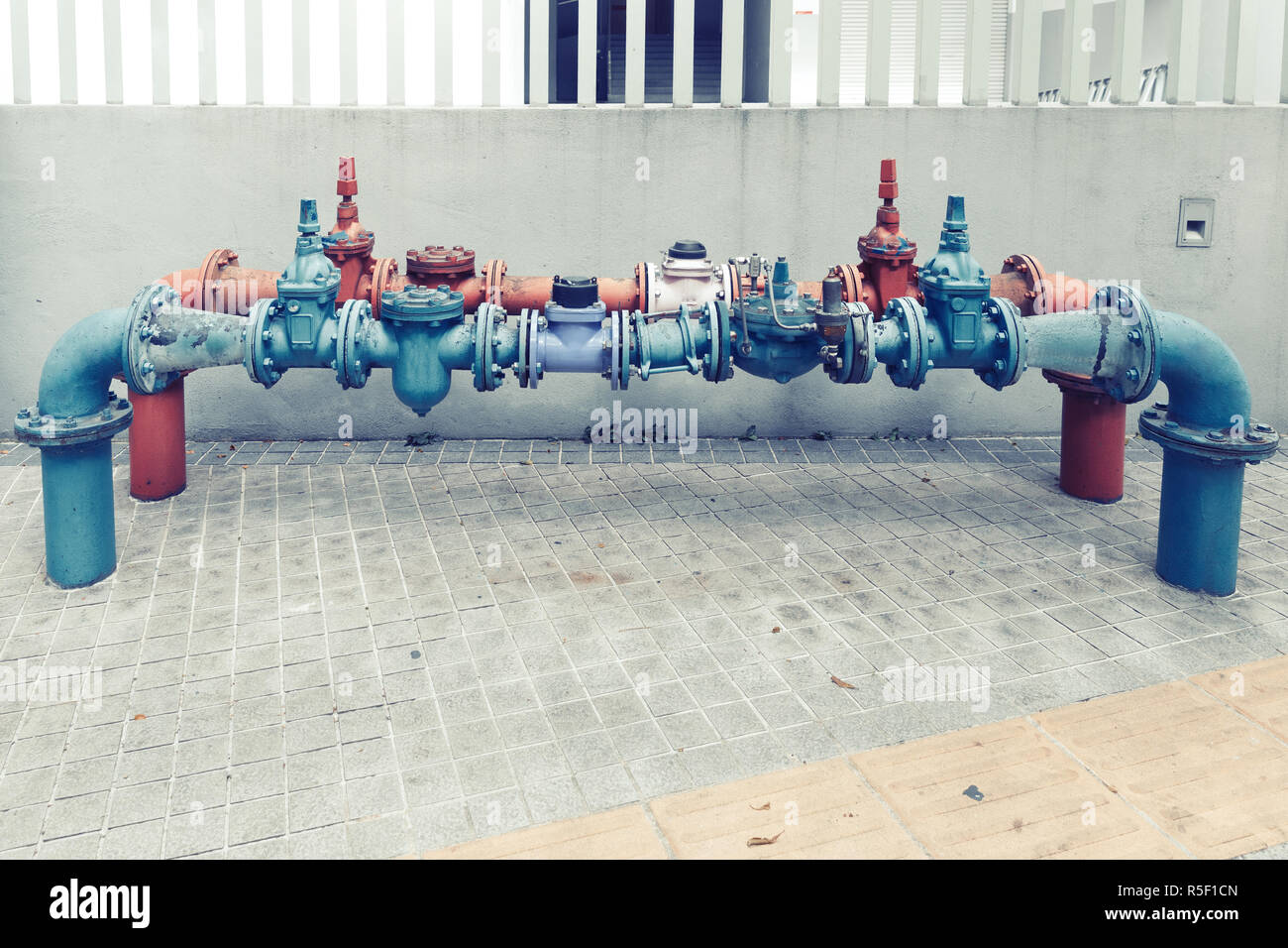 Water pipes joined with valves of the water supply system on a street ...