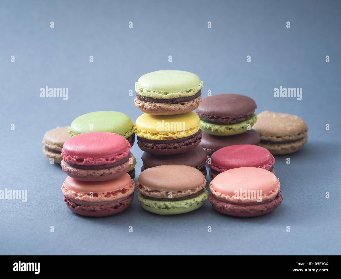 Tasty French cuisine pastry macaron variations and colours with an ...