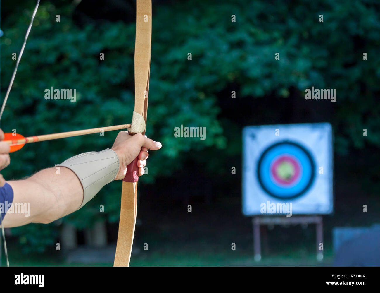 archer aiming arrow at sport aim Stock Photo - Alamy