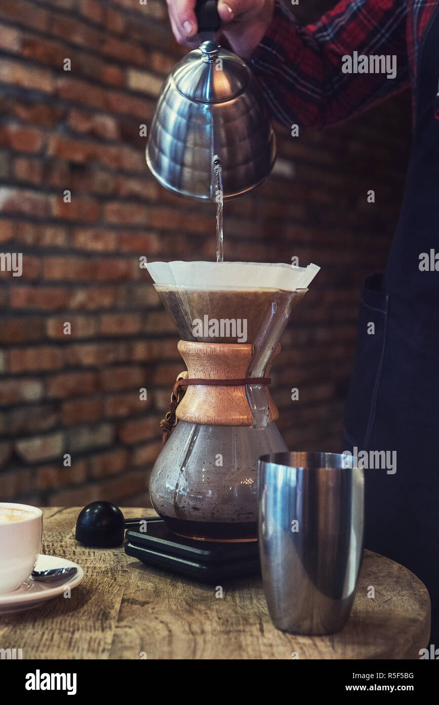 Barista brewing coffee Stock Photo - Alamy