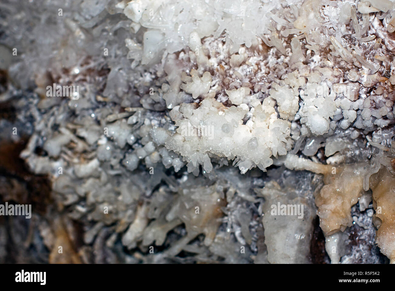 white crystal formations minerals natural cave Stock Photo - Alamy