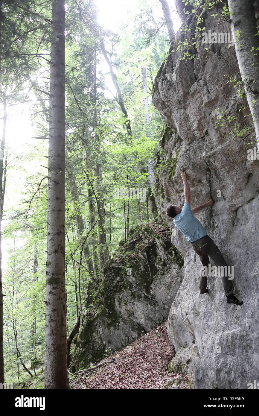 climber exercises on a small rock wall Stock Photo - Alamy
