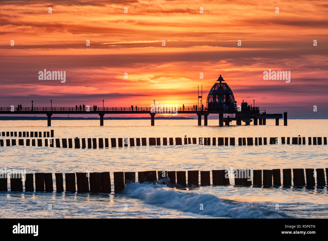 pier zingst with diving gondola in the sunset Stock Photo - Alamy