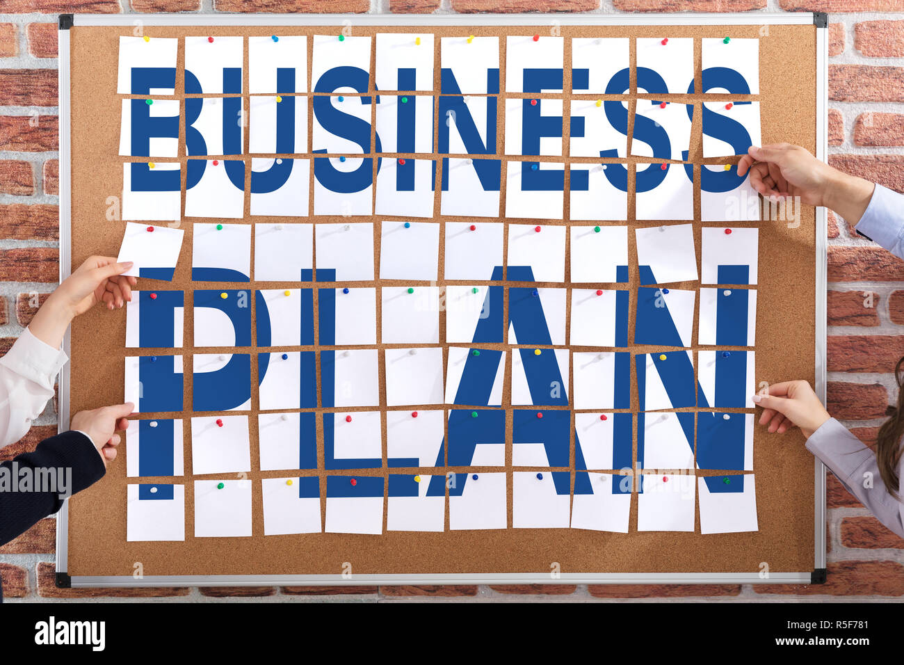 Business Plan Written On Paper Notes Stock Photo - Alamy
