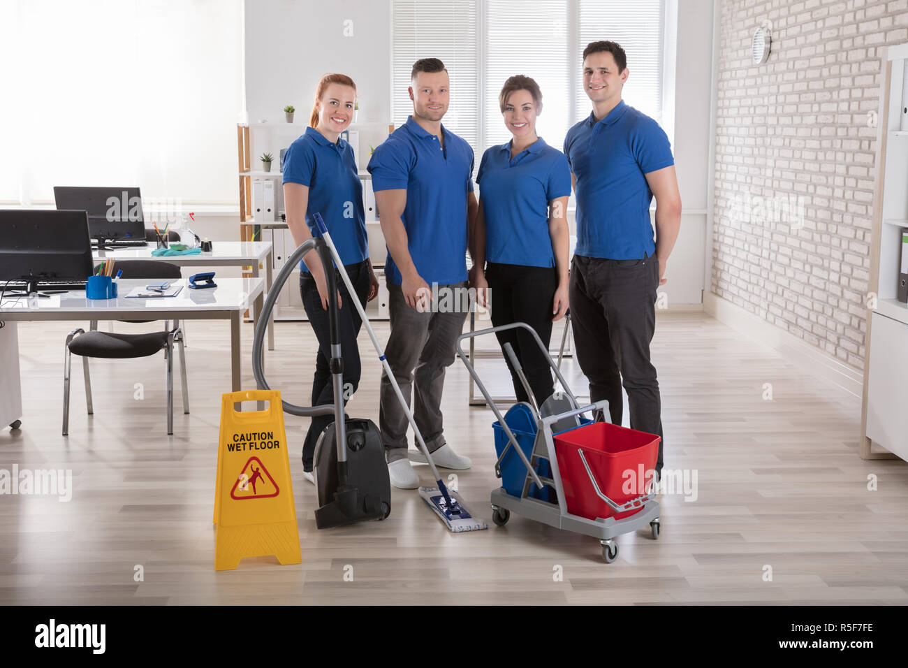 Housekeeper housekeeping cleaning staff worker workers hi-res stock ...