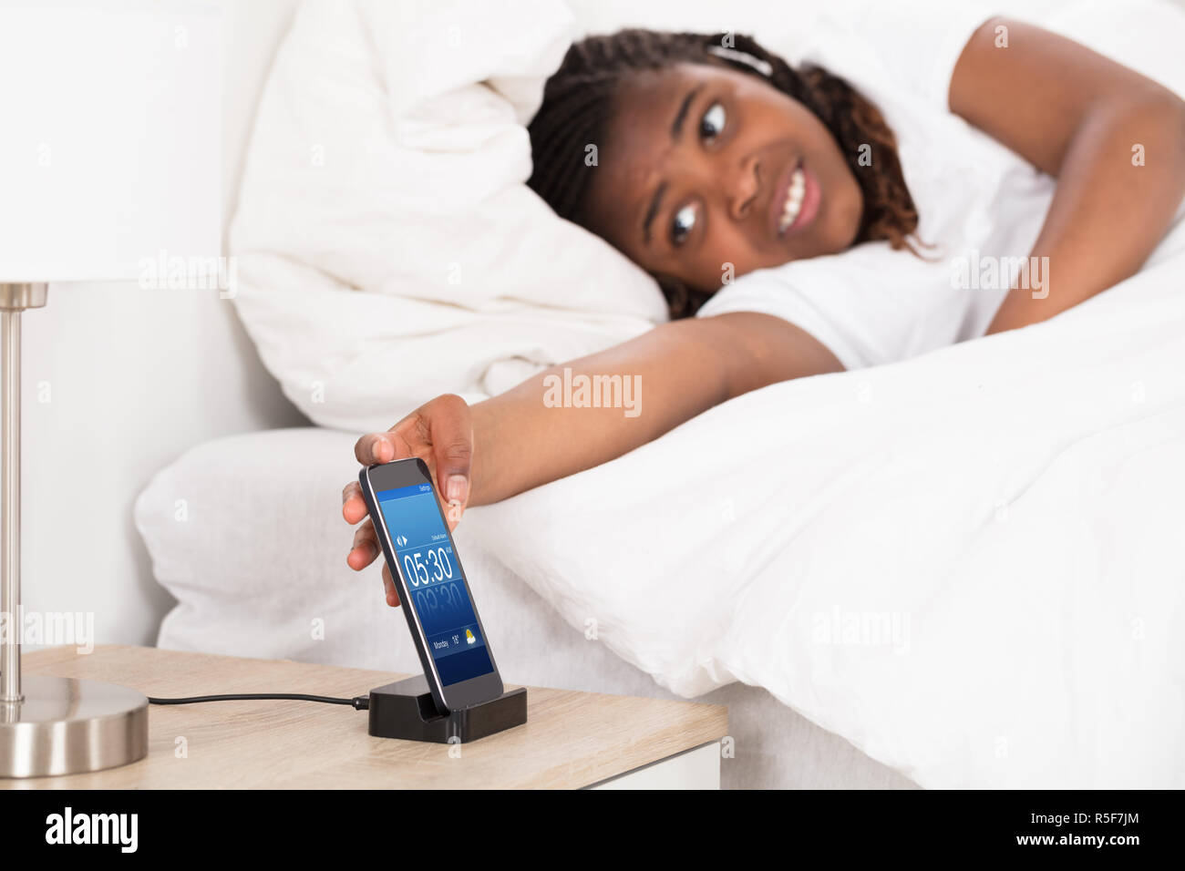 African Girl Waking Up Stock Photo - Alamy