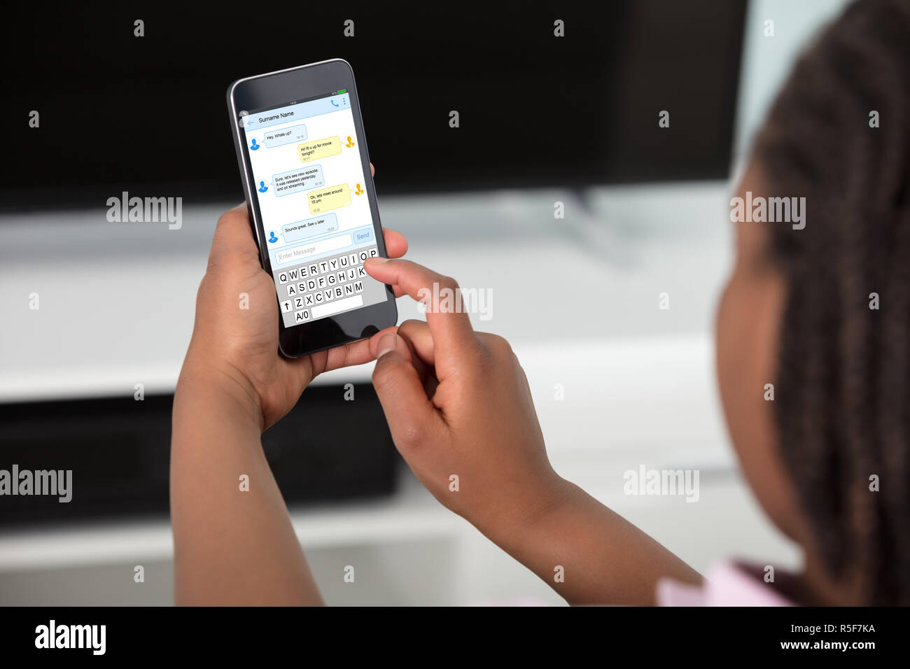 Child texting screen showing hi-res stock photography and images - Alamy