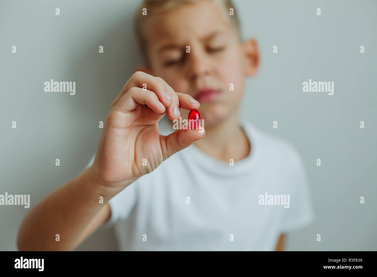 Little boy having a headache Stock Photo - Alamy