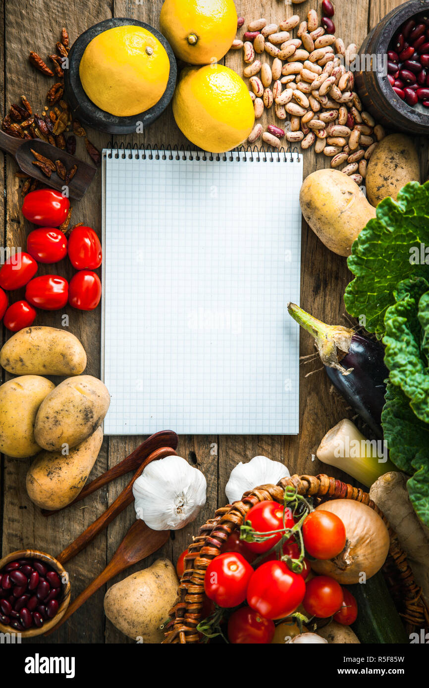 Vegetables with notebook Stock Photo - Alamy