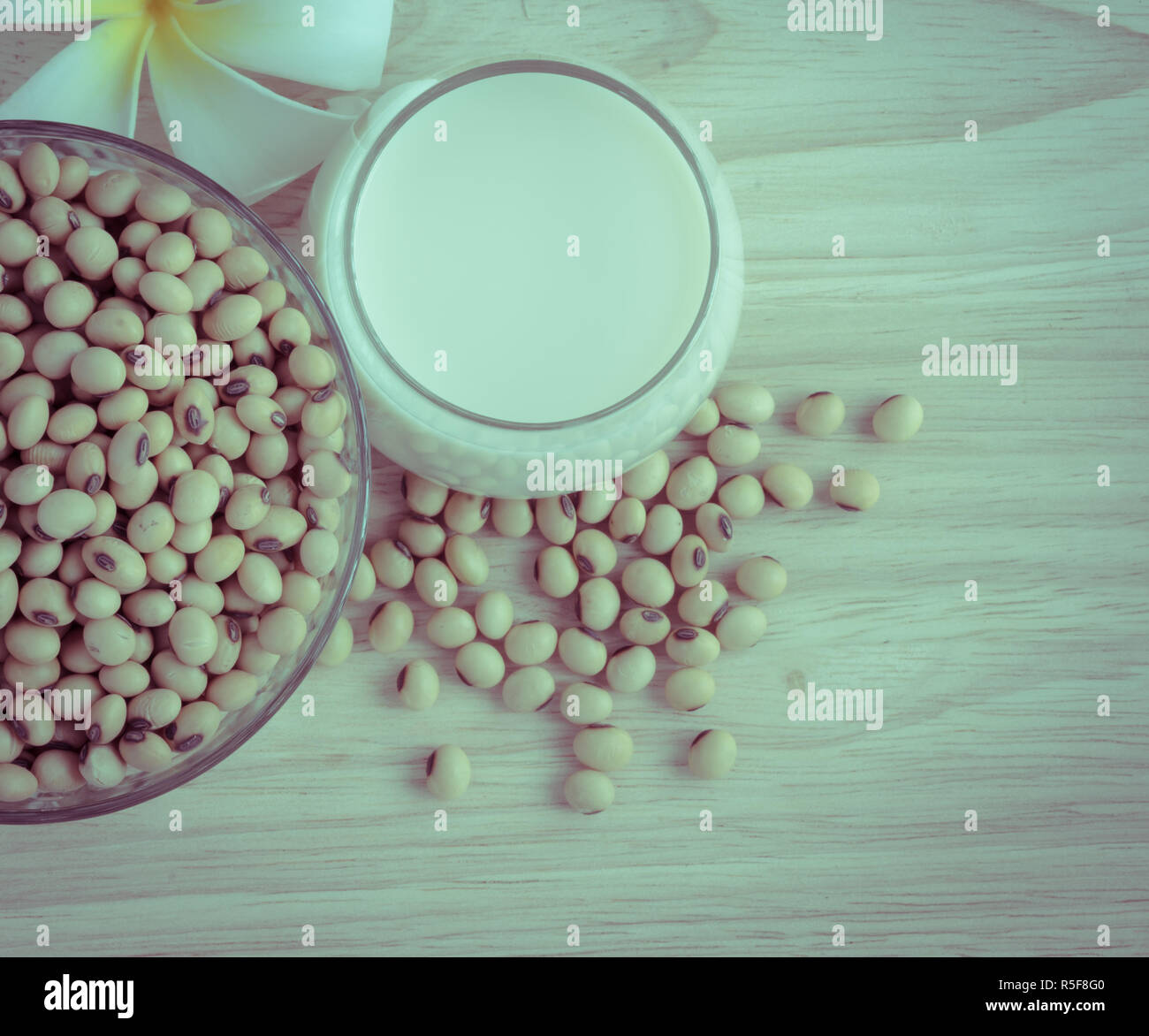 Fresh Soy milk (Soya milk) in a glass and soybean seeds Stock Photo - Alamy
