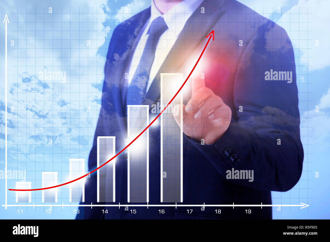 business man shows growth Stock Photo - Alamy