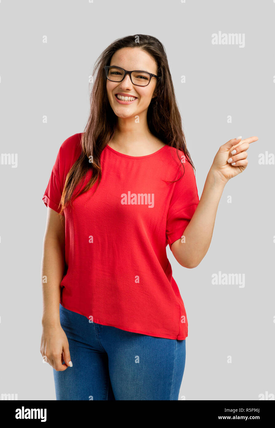 Happy woman pointing to the camera Stock Photo - Alamy