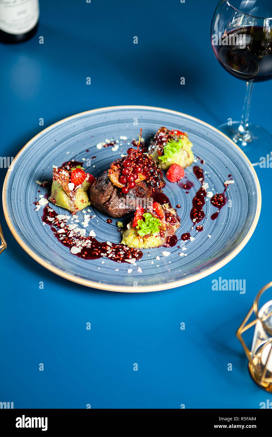 Fine dining Grilled steak with vegetables in restaurant, Professional ...