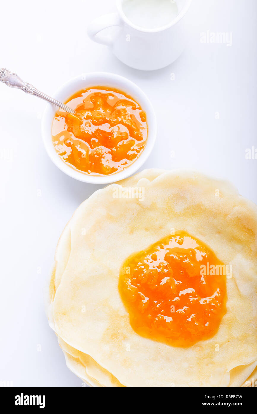 Crispy crepes with apricot jam Stock Photo - Alamy