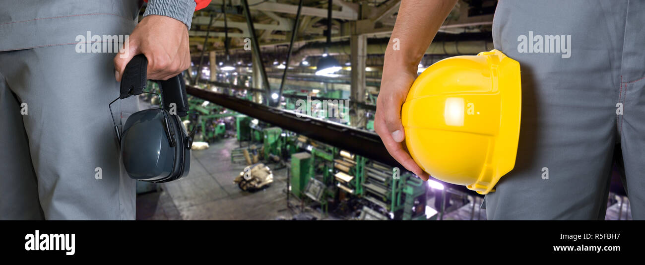 Workers with safety uniform Stock Photo - Alamy