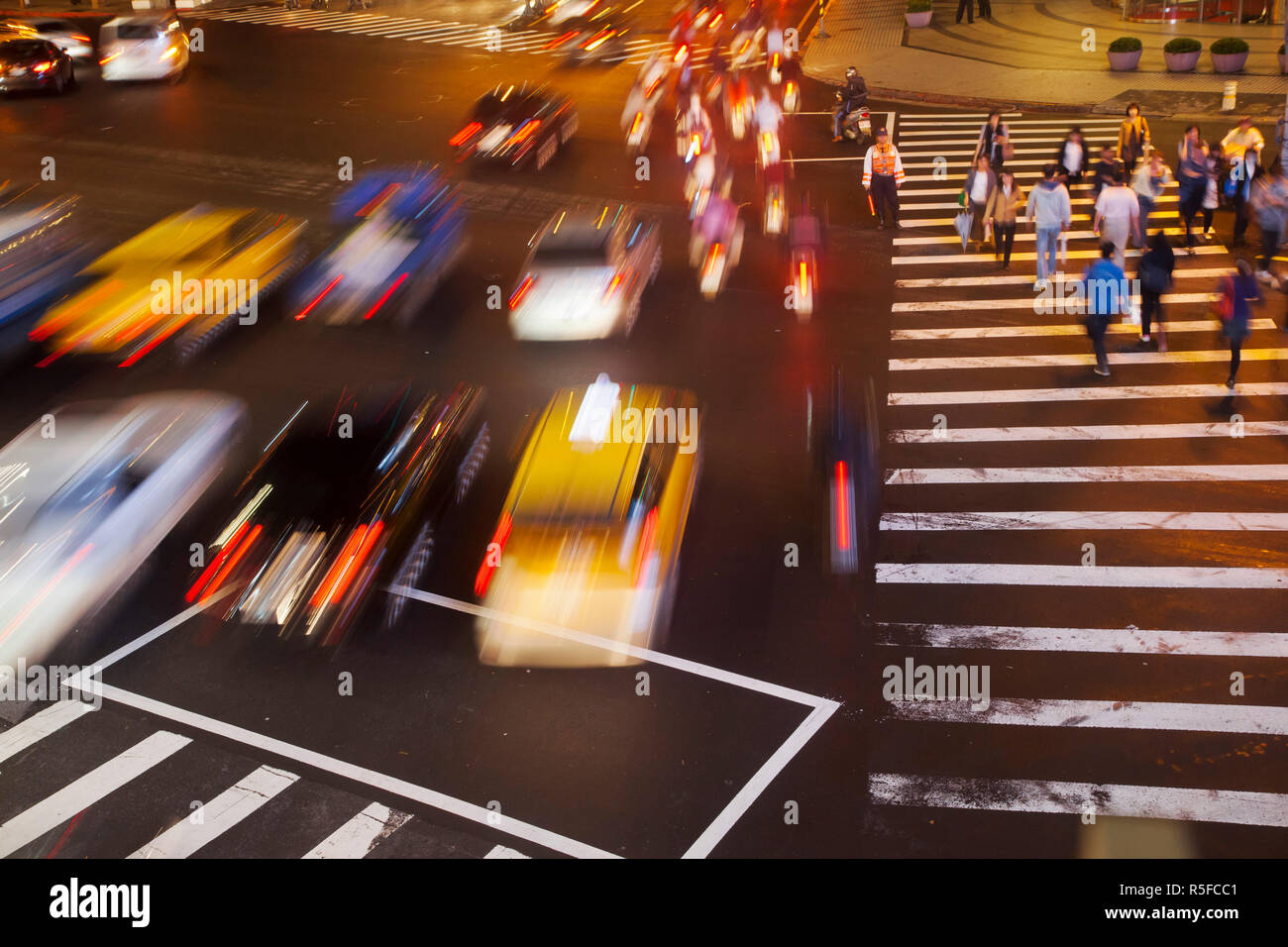 Taiwan, Taipei, Traffic on road near Taipei 101 at night Stock Photo ...