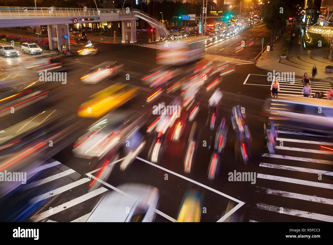 Taiwan, Taipei, Traffic on road near Taipei 101 at night Stock Photo ...