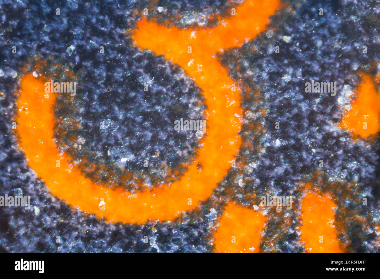 Embedded digit 3 on sim card under the microscope Stock Photo - Alamy