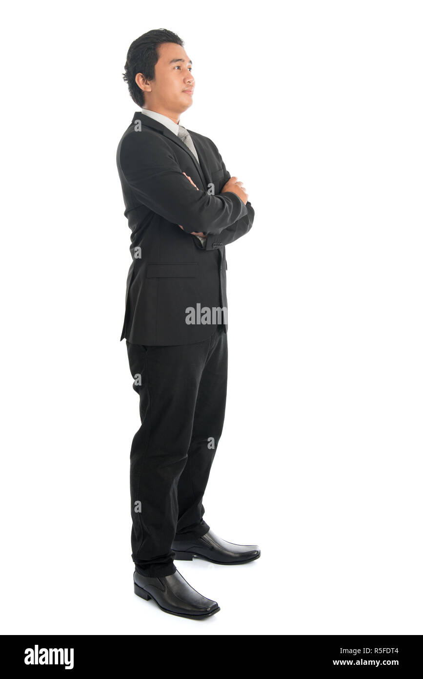 Side view Asian businessman arms folded Stock Photo - Alamy