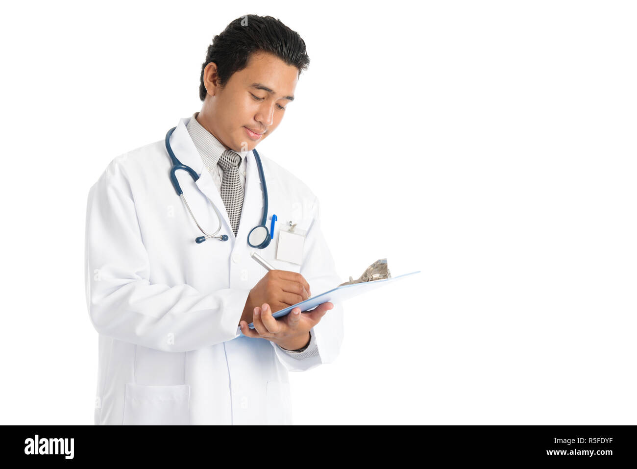 Medical doctor writing Stock Photo - Alamy