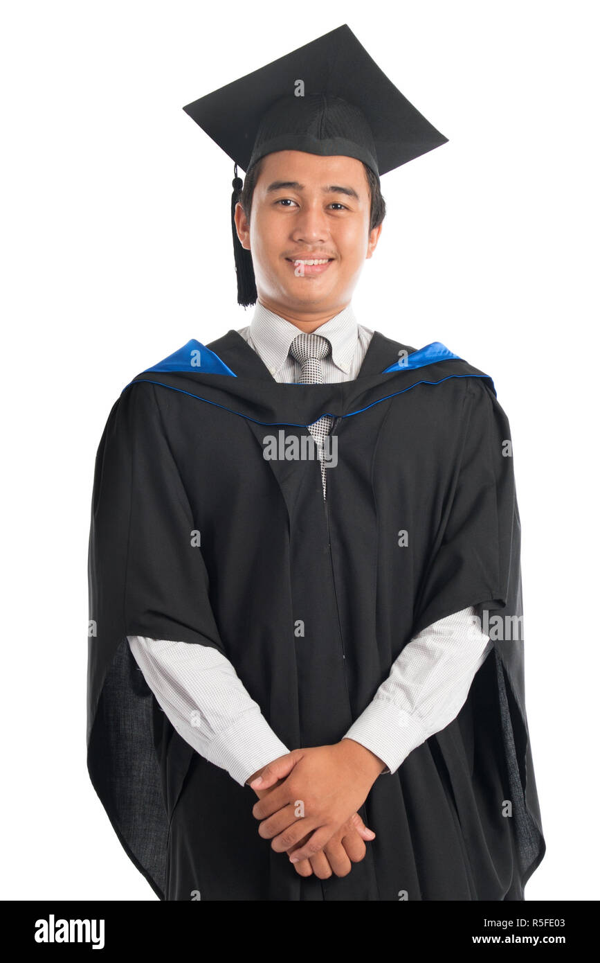 Portrait of university student in graduation gown Stock Photo - Alamy