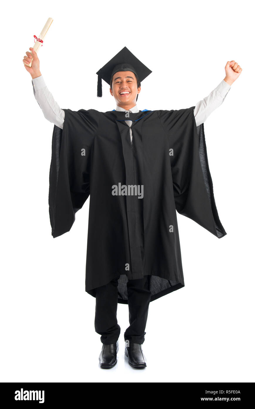 Graduate university student cheering Stock Photo - Alamy