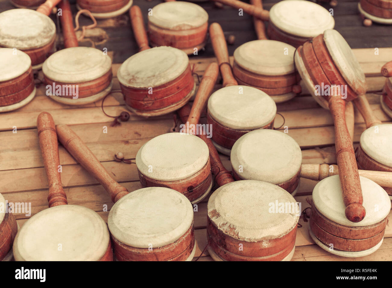 kids toys percussion with handle stick traditional music tools Stock ...