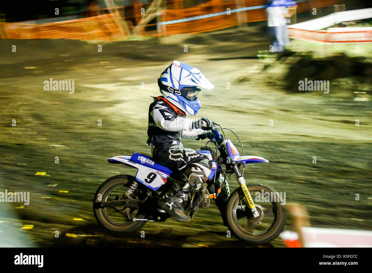 Kids Motocross at night Stock Photo - Alamy