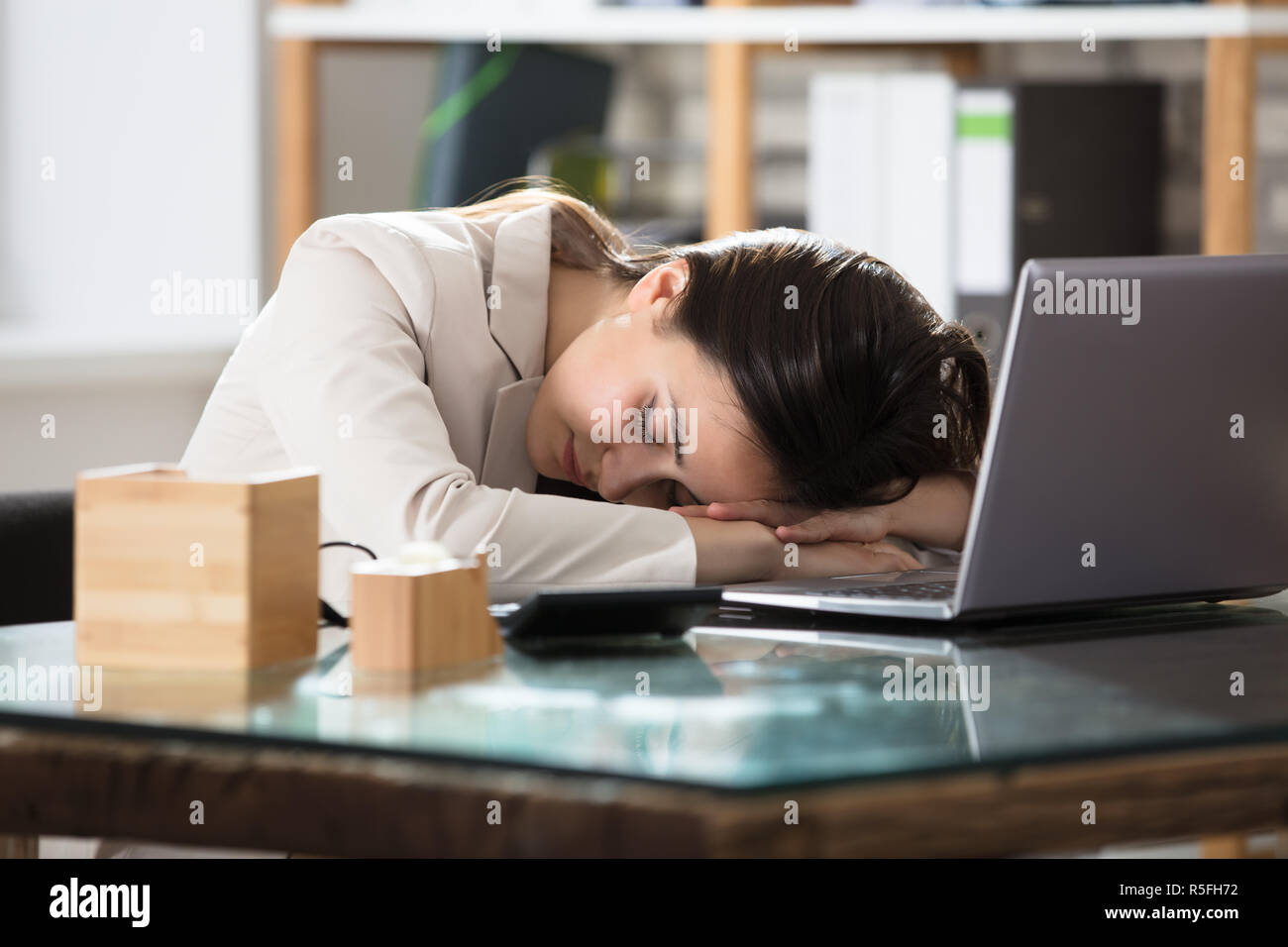 Office workers sleeping at desk hi-res stock photography and images - Alamy