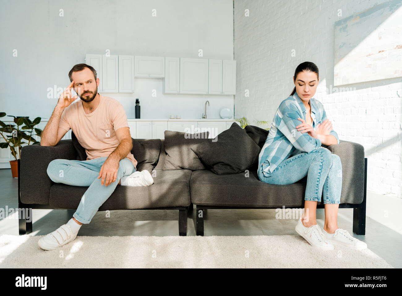 Opposite ends of sofa hi-res stock photography and images - Alamy