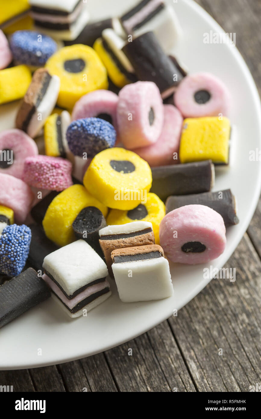 Gummy candies on wooden table hi-res stock photography and images - Alamy